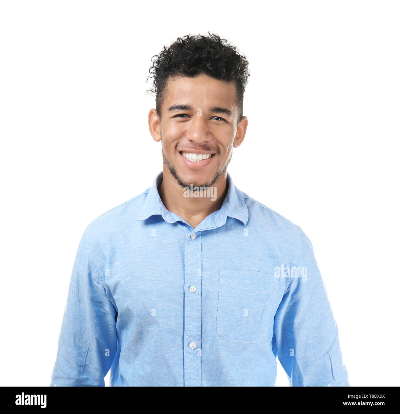 Handsome African-American man in formal clothes on white background ...