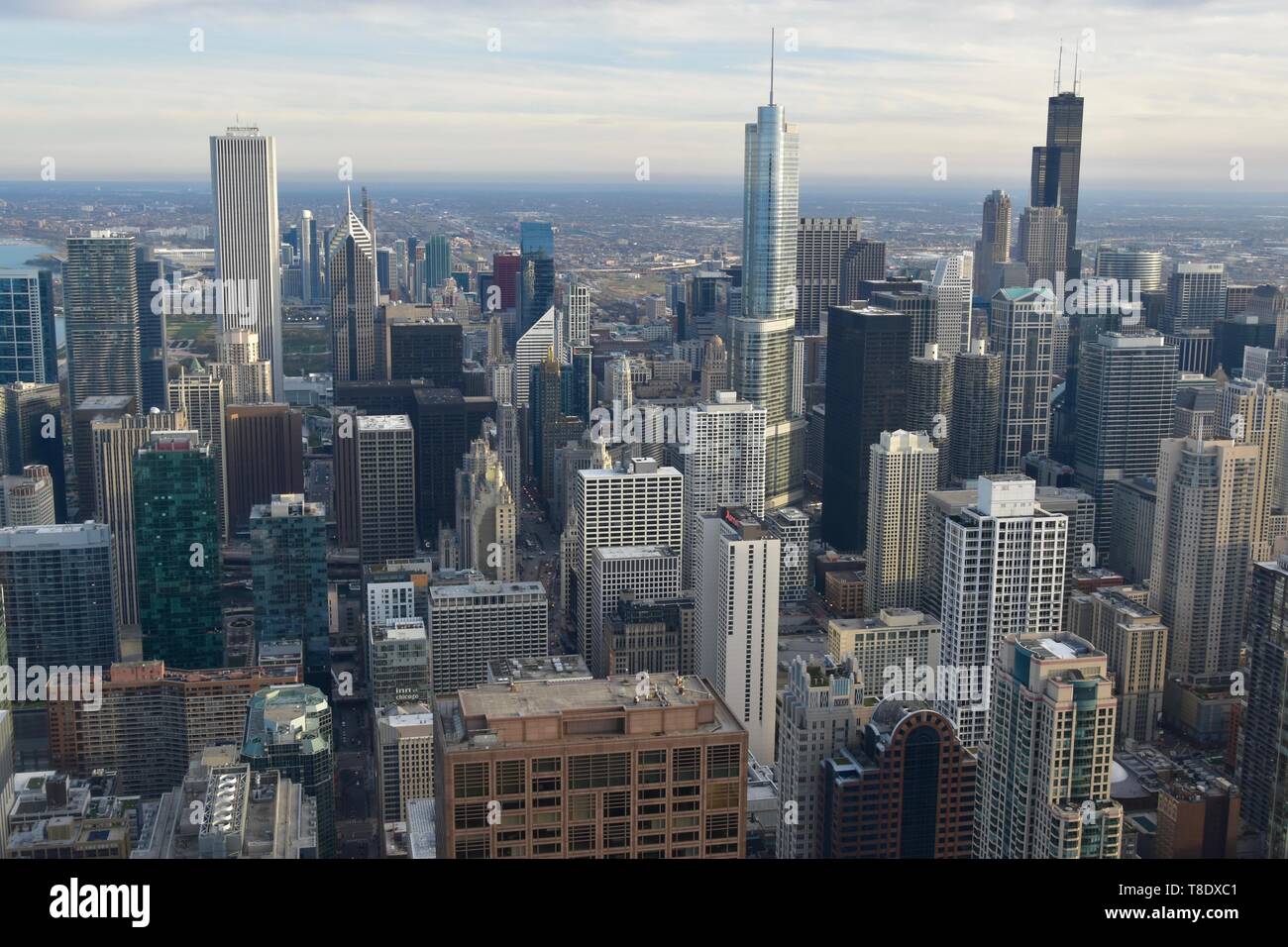 Chicago at sunset as seen from above at 360 Chicago atop the John ...