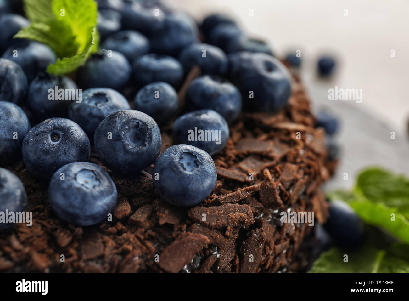 Delicious blueberry chocolate cake, closeup Stock Photo - Alamy