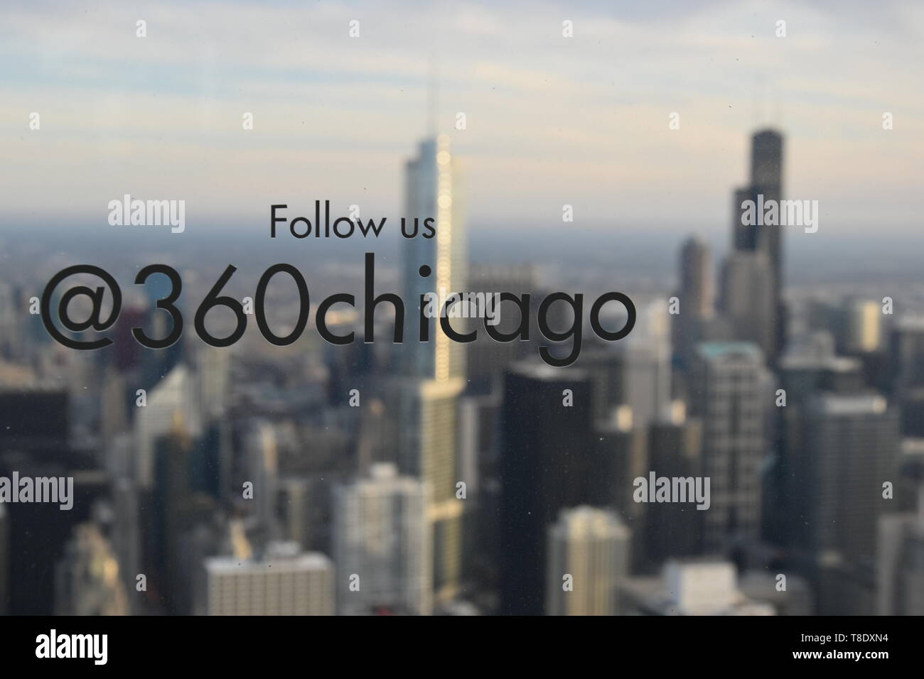 Chicago at sunset as seen from above at 360 Chicago atop the John ...