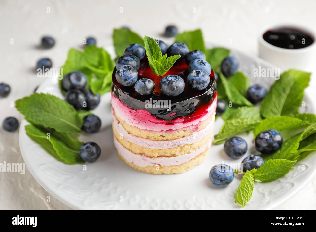 Delicious blueberry dessert on plate Stock Photo - Alamy