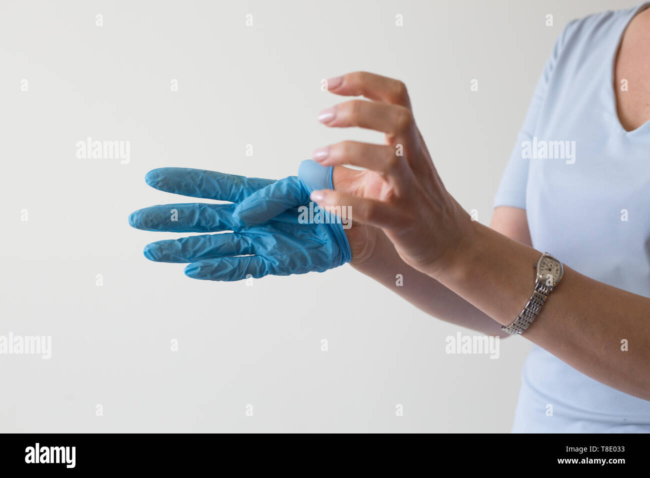 Female doctor rubber gloves hi-res stock photography and images - Alamy
