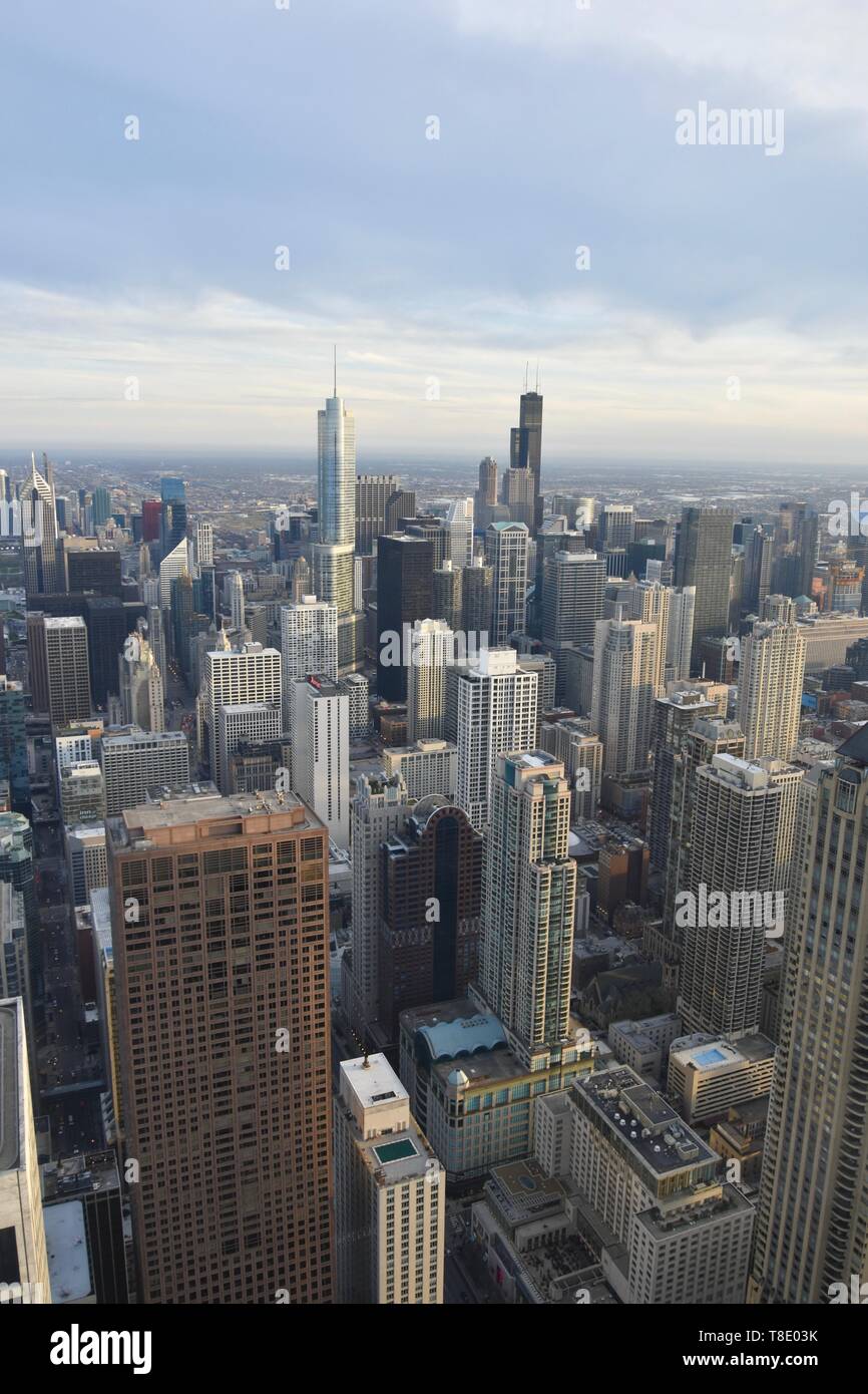 Chicago at sunset as seen from above at 360 Chicago atop the John ...