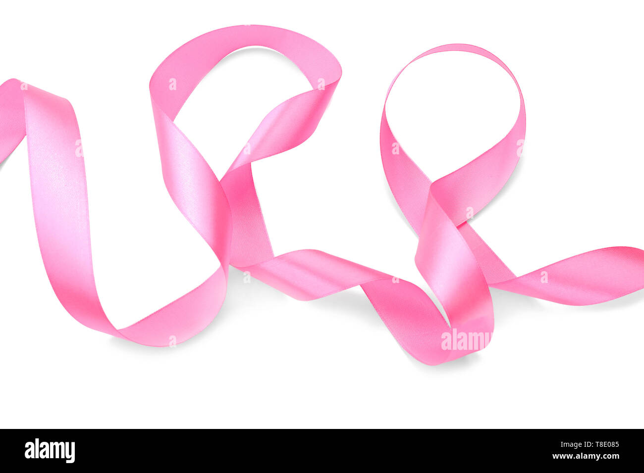 Curled pink ribbon on white background Stock Photo - Alamy