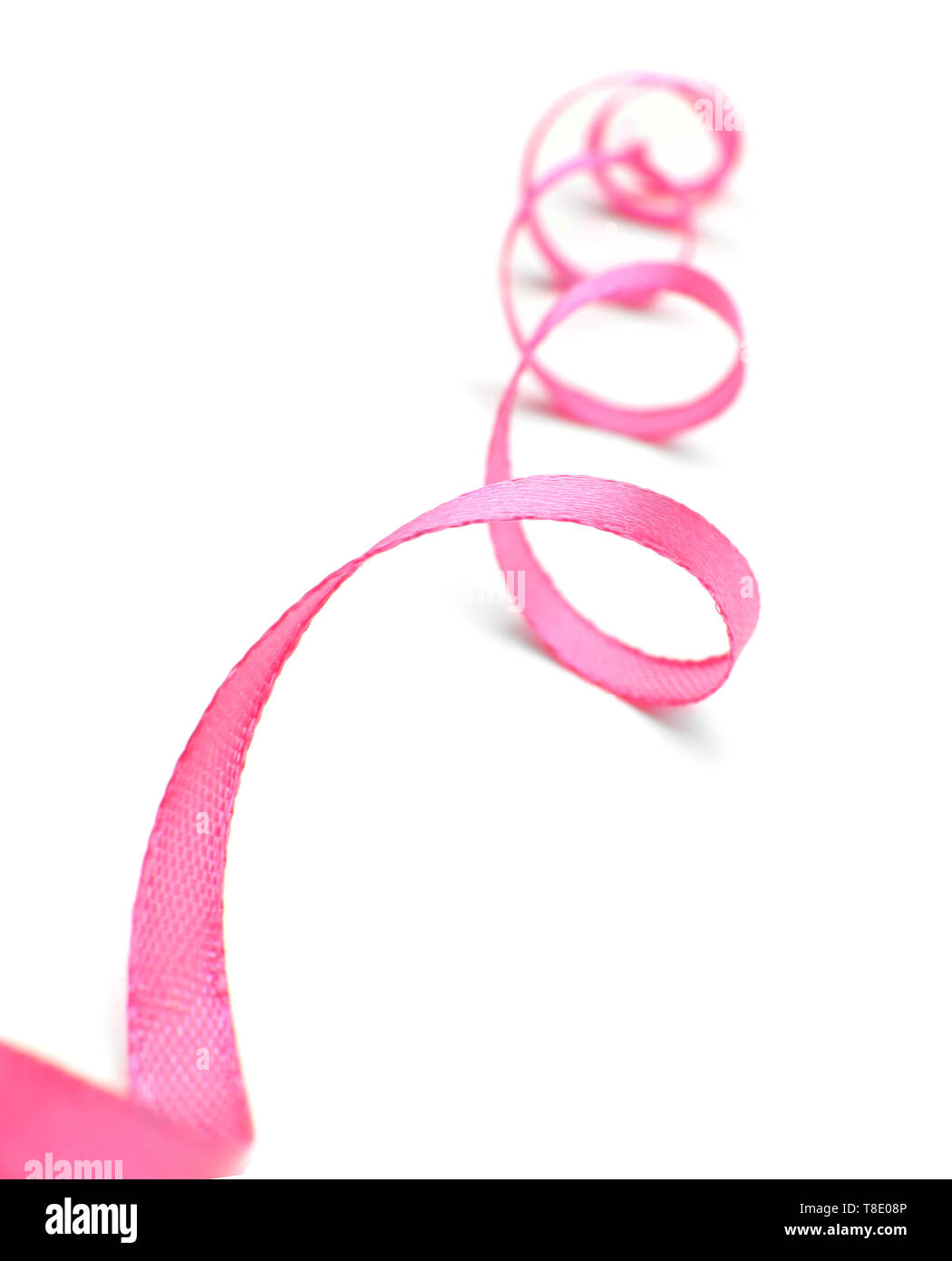 Curled pink ribbon on white background Stock Photo - Alamy
