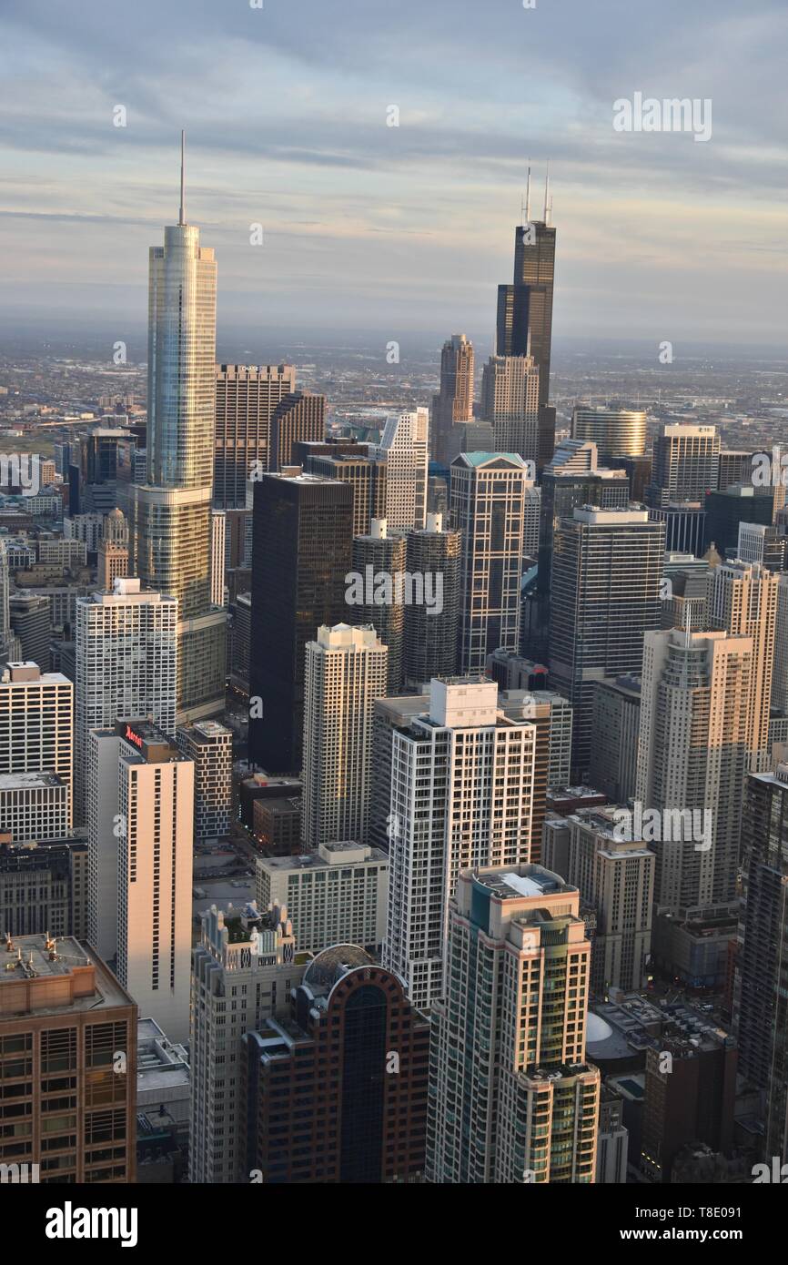 Chicago at sunset as seen from above at 360 Chicago atop the John ...