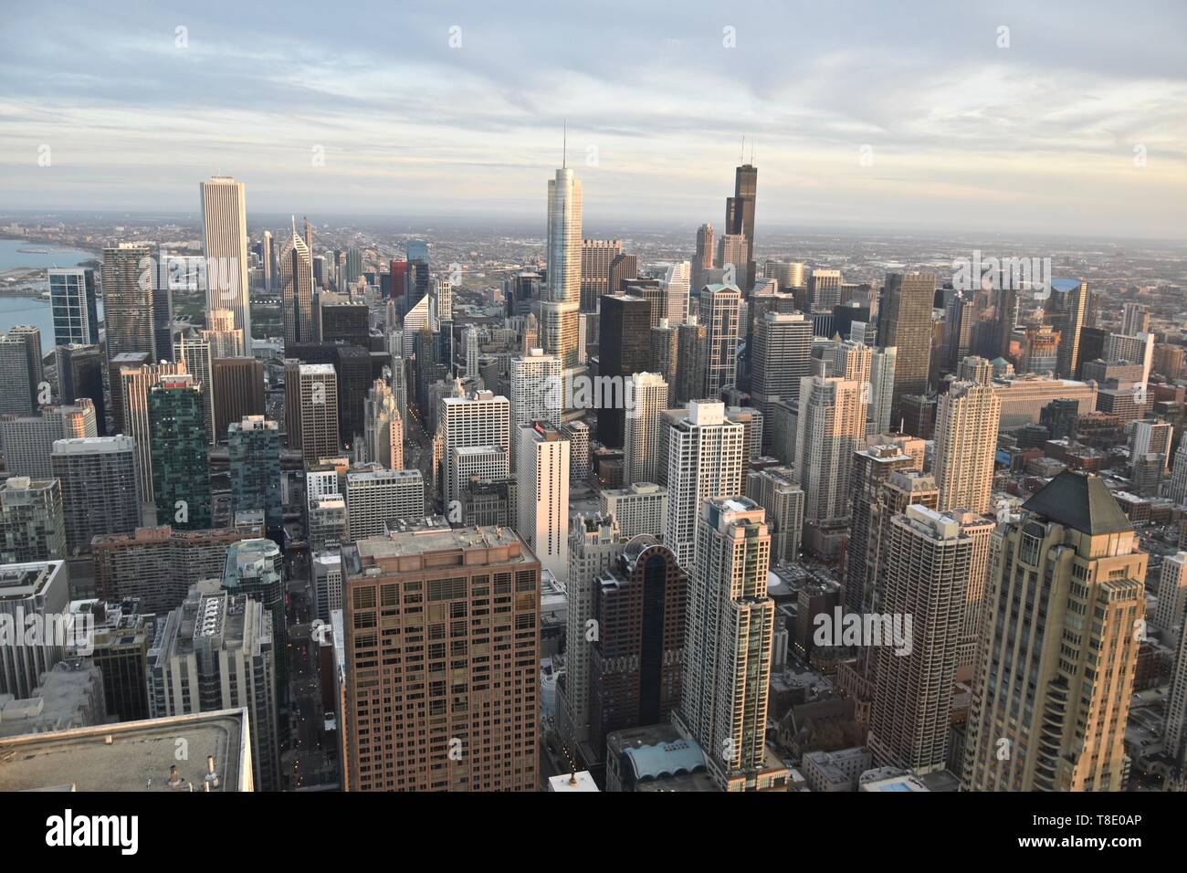 Chicago at sunset as seen from above at 360 Chicago atop the John ...