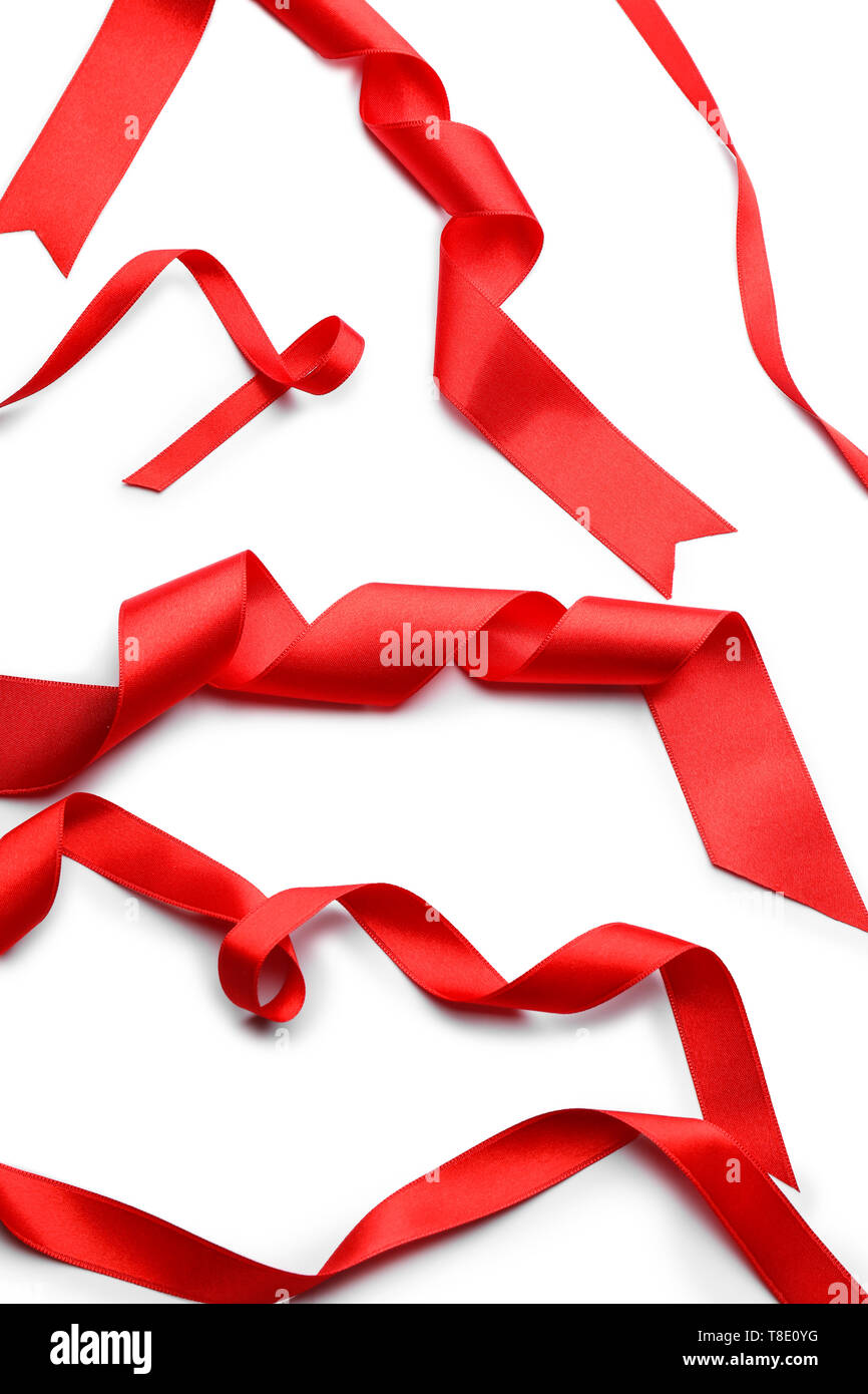 Curled red ribbons on white background Stock Photo - Alamy