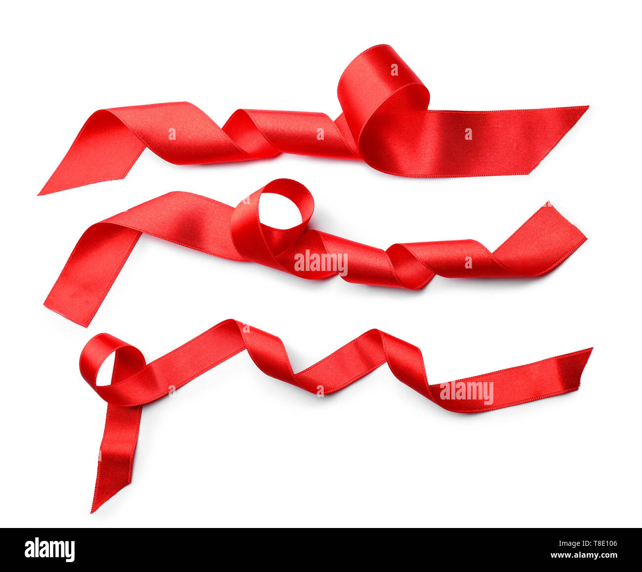 Curled red ribbons on white background Stock Photo - Alamy