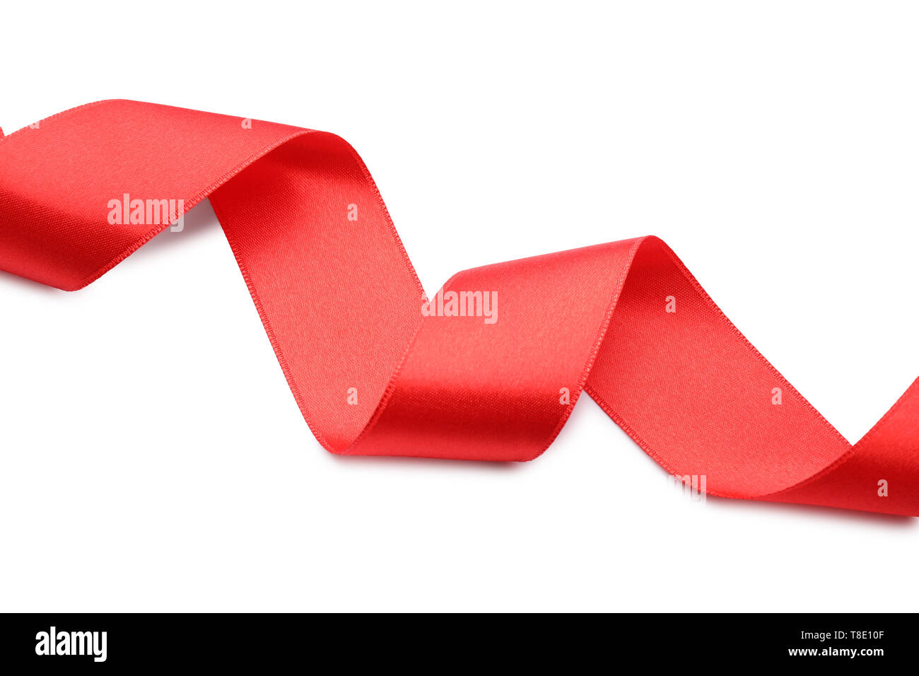 Curled red ribbon on white background Stock Photo - Alamy