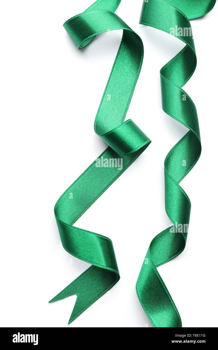 Green satin ribbons on white background Stock Photo - Alamy