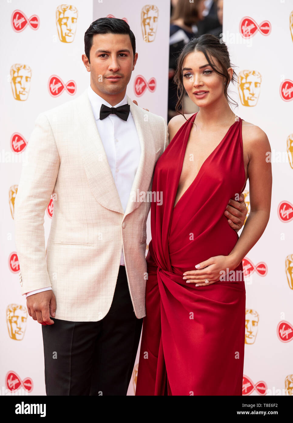 London, UK. 12th May, 2019. George Panayiotou and Amy Jackson attend ...