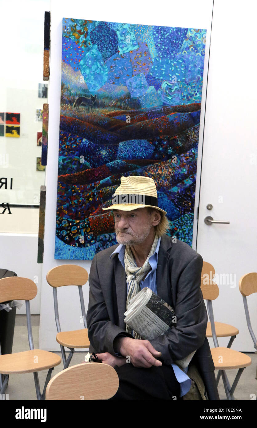 New York City, New York, USA. 12th May, 2019. A man attends the opening ...