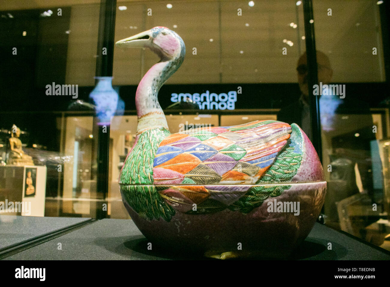 London, UK. 13th May, 2019. A Rare pair of famille rose 'goose' tureens ...