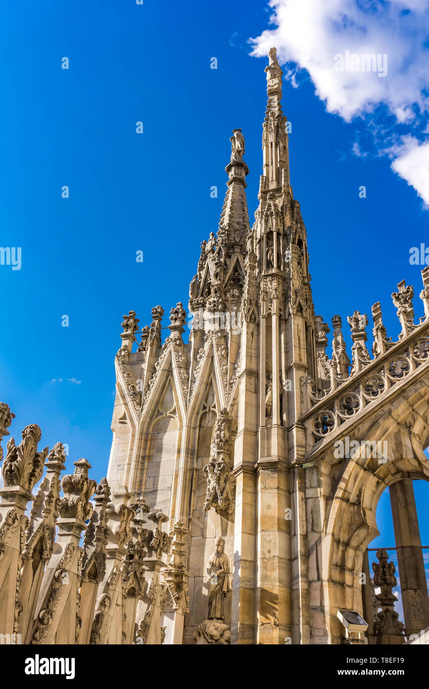 Gothic rooftop terraces of Milan Duomo in Italy Stock Photo - Alamy