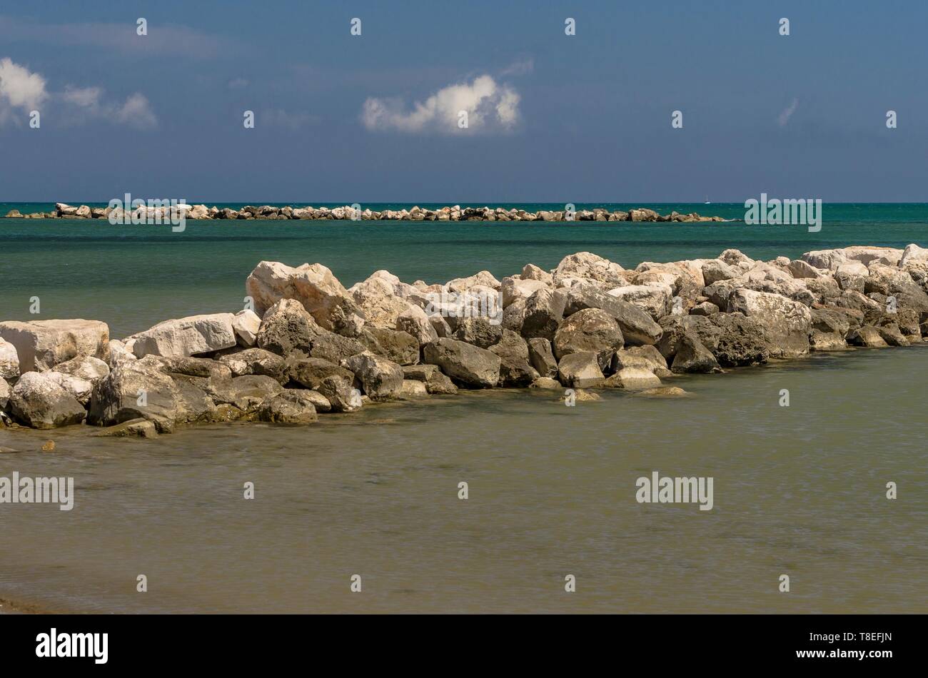 Seascape with cliff and crystal clear water Stock Photo - Alamy
