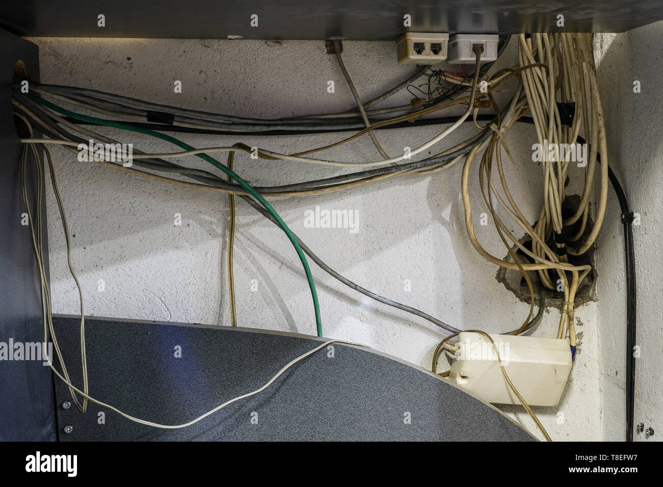 tangled network cables and wires in server room Stock Photo - Alamy