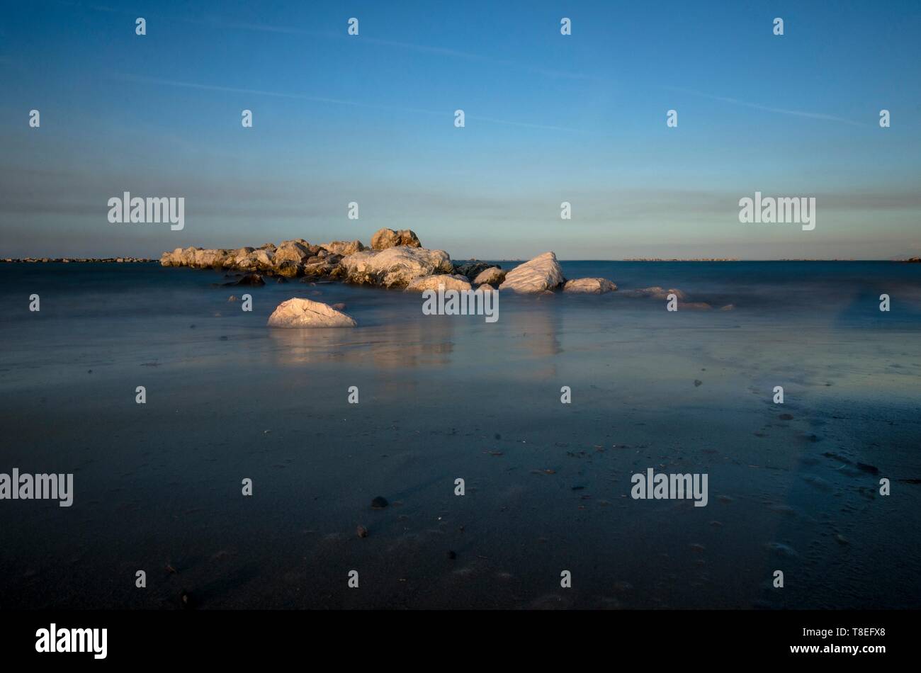 Rock emerging from sea hi-res stock photography and images - Alamy