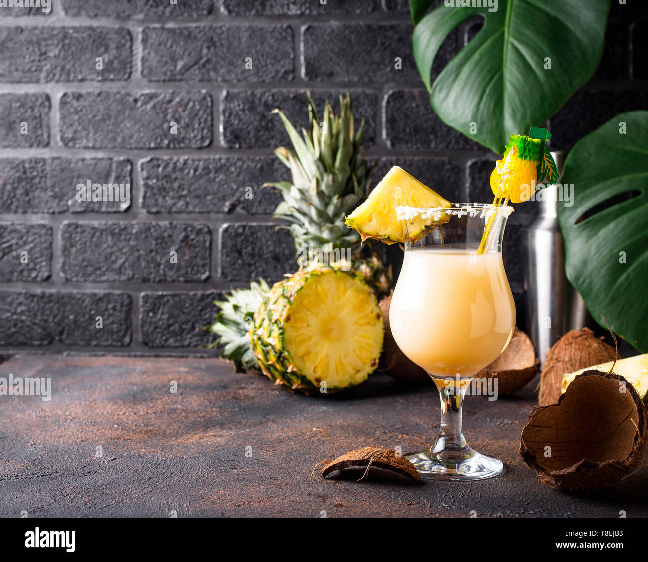 Pina colada cocktail with coconut and pineapple Stock Photo - Alamy