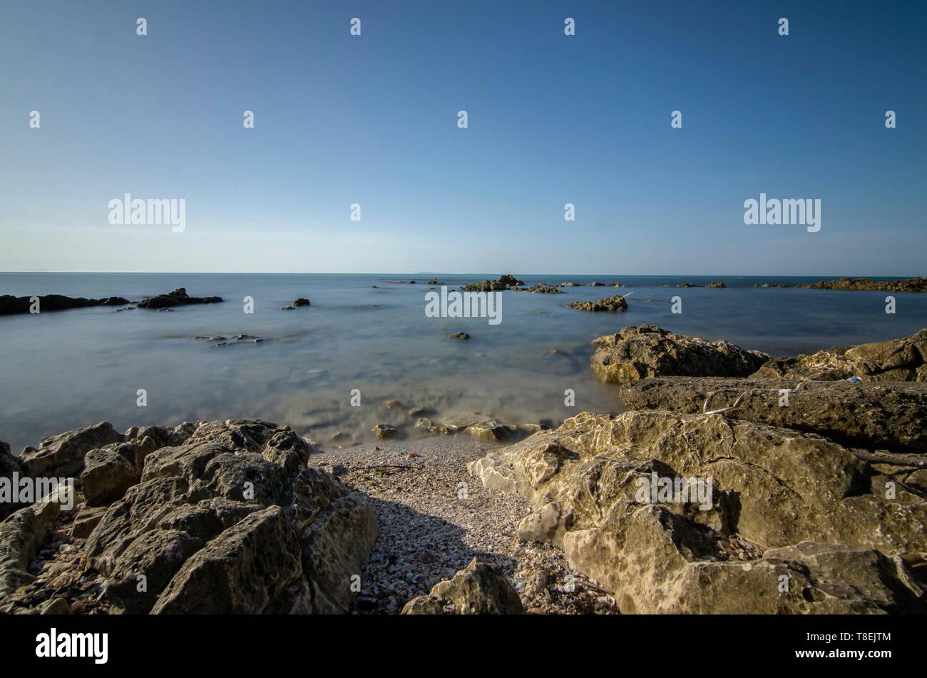 Sea landscape with rocks emerging from the sea Stock Photo - Alamy