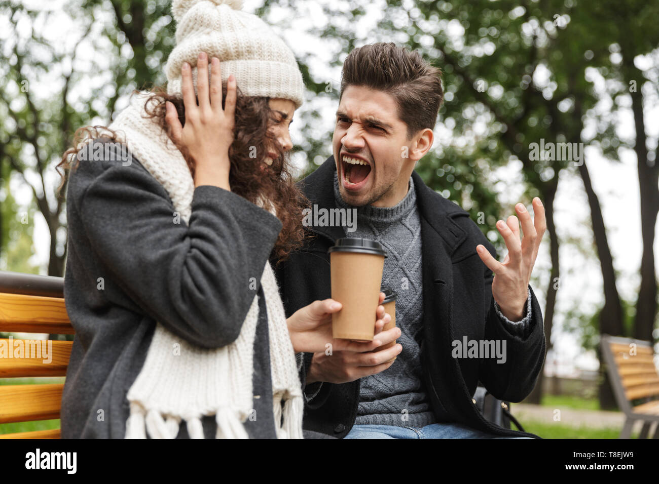 Portrait of unhappy people man and woman 20s having quarrel and ...