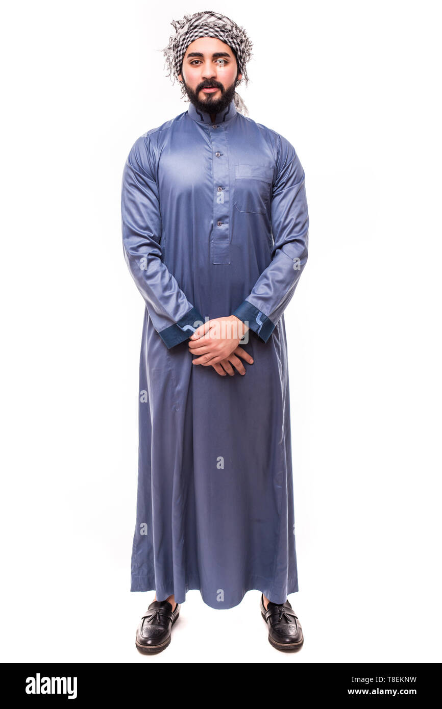 Young arab handsome man wearing in traditional abaya clothes isolated ...