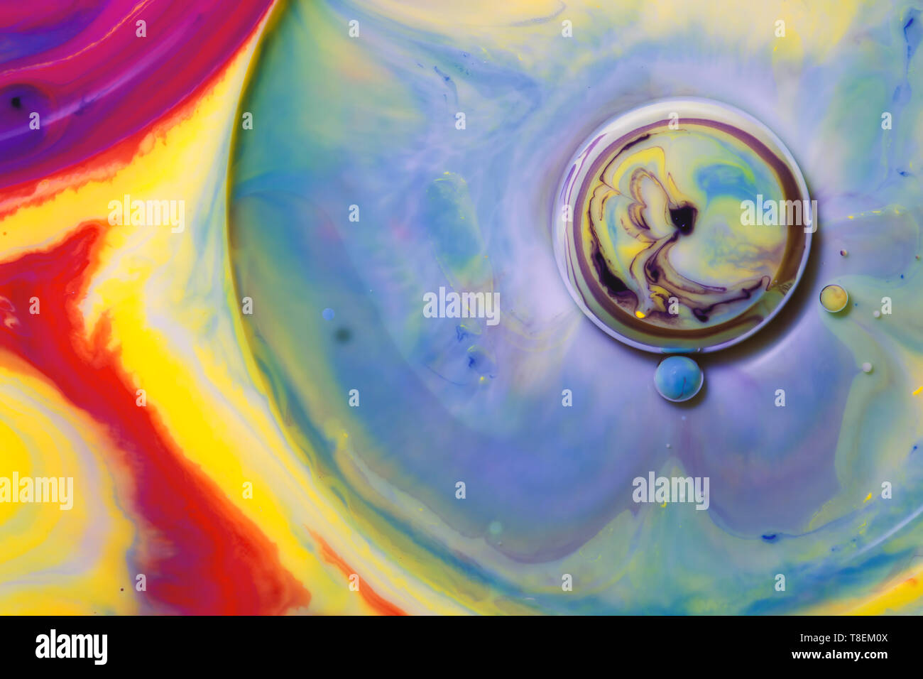 Macro photography of colorful bubbles in some fluids producing vibrant ...