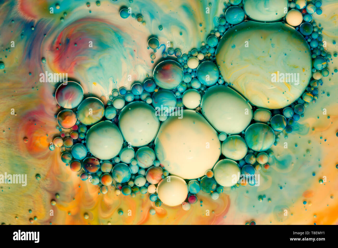 Macro photography of colorful bubbles in some fluids producing vibrant ...