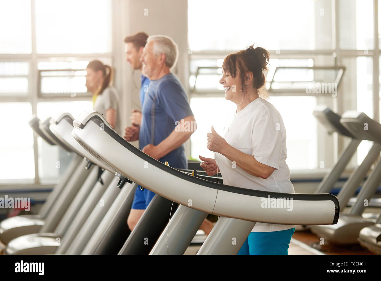 Mature woman on treadmill hi-res stock photography and images - Alamy