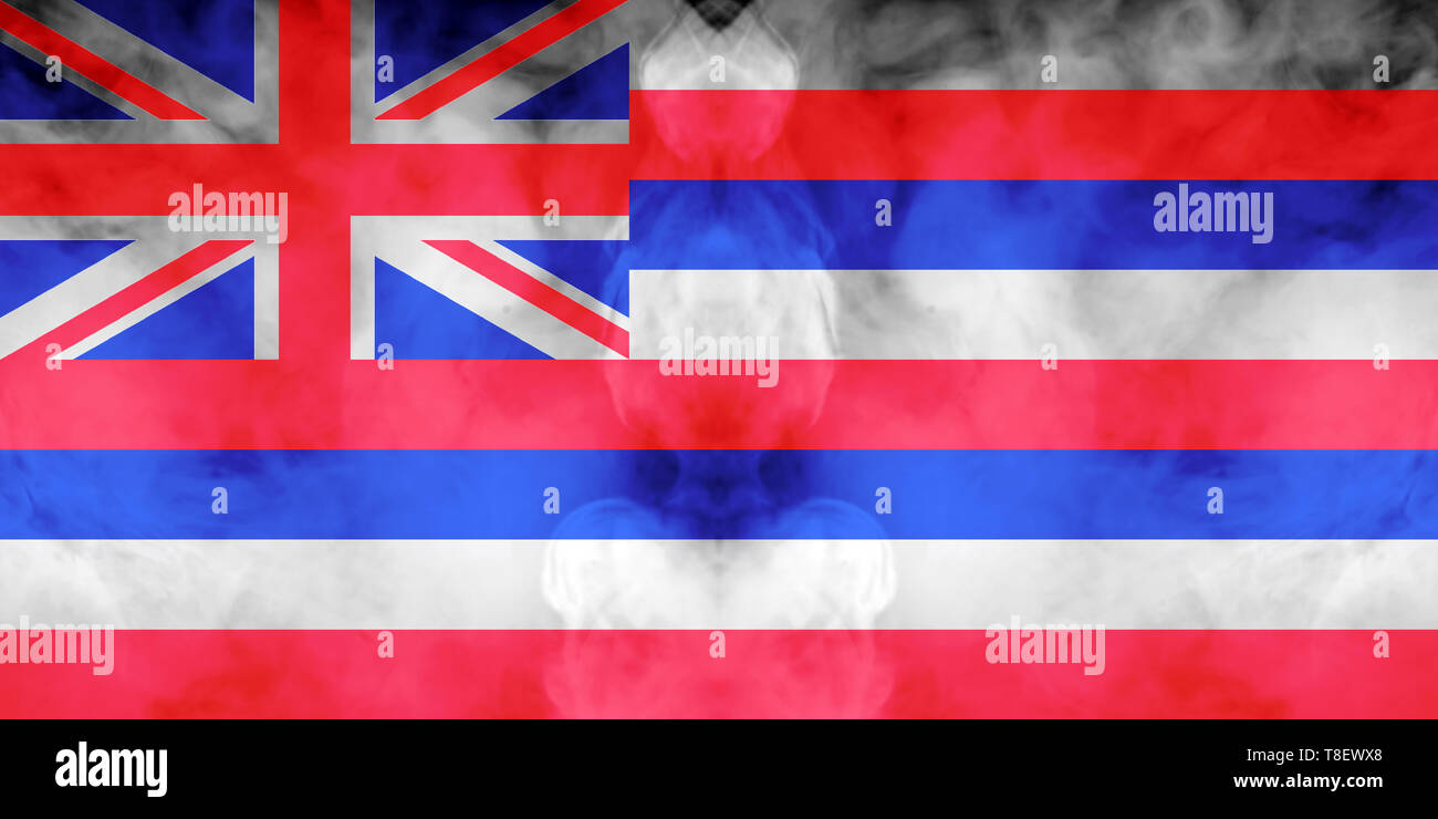 The national flag of the US state Hawaii in against a gray smoke on the ...