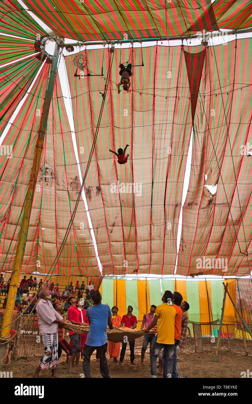 Troop members seen performing during the circus show. Bangladesh has a ...