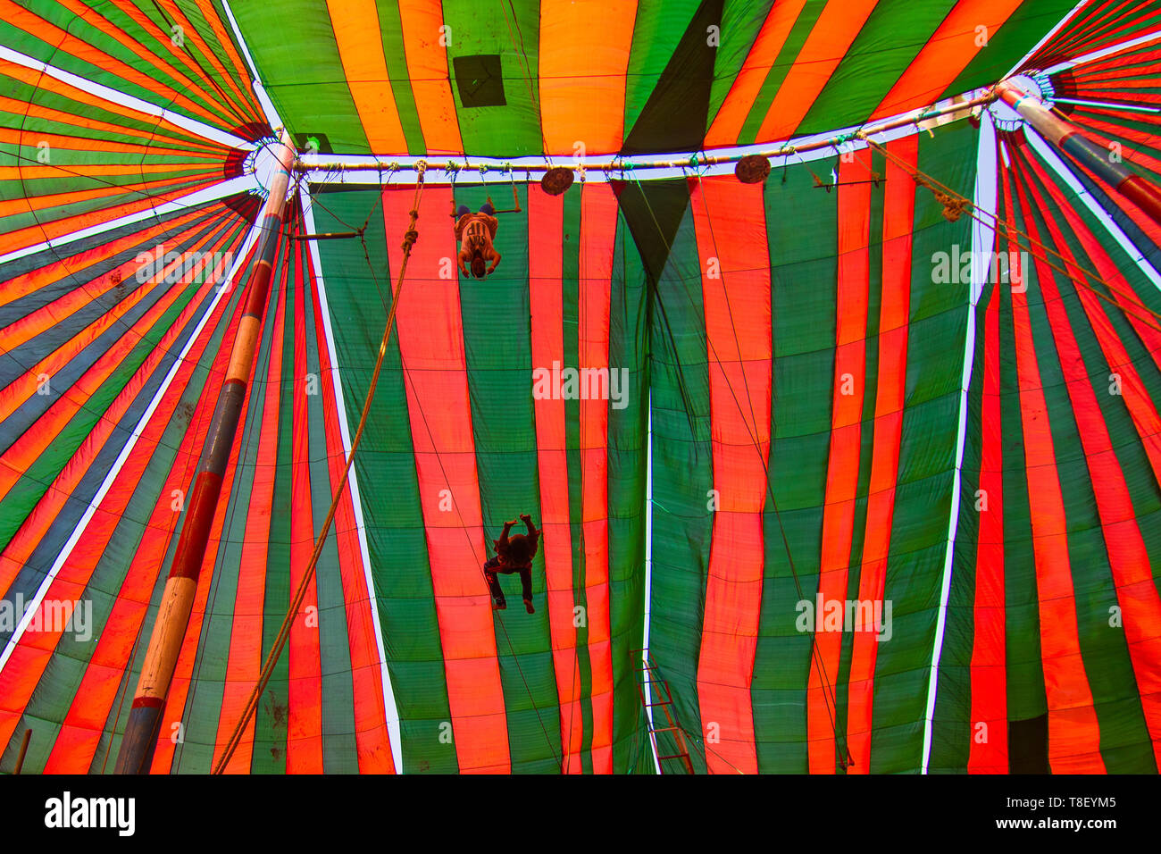 Troop members seen performing during the circus show. Bangladesh has a ...