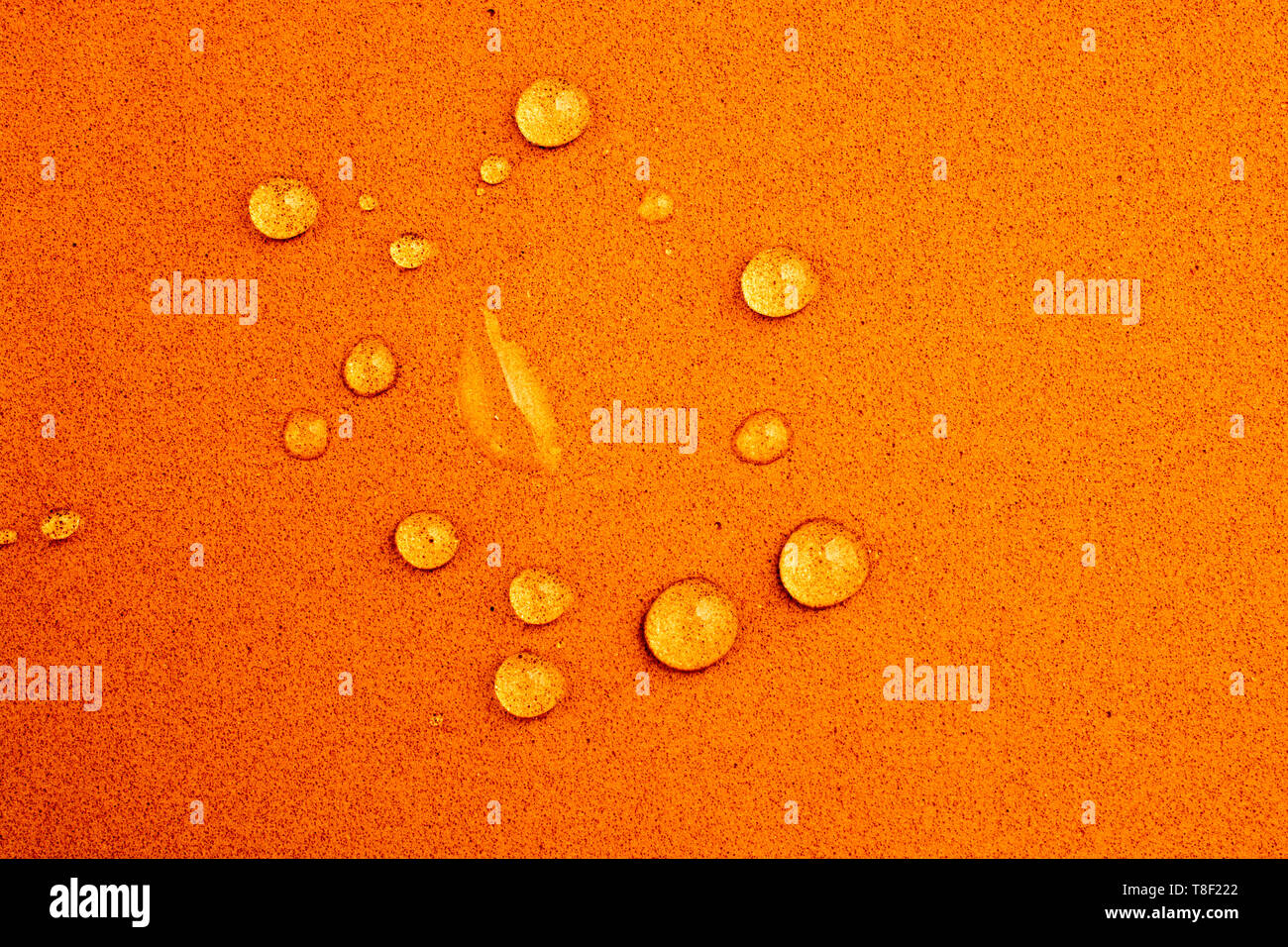 Round water drops in close-up view on colorful background Stock Photo ...