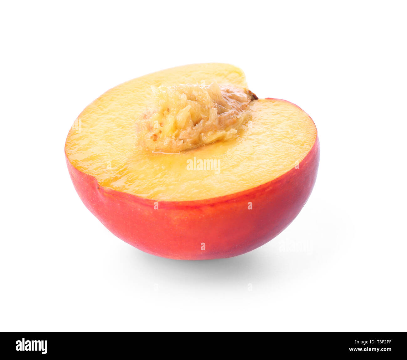 Half of fresh peach on white background Stock Photo - Alamy