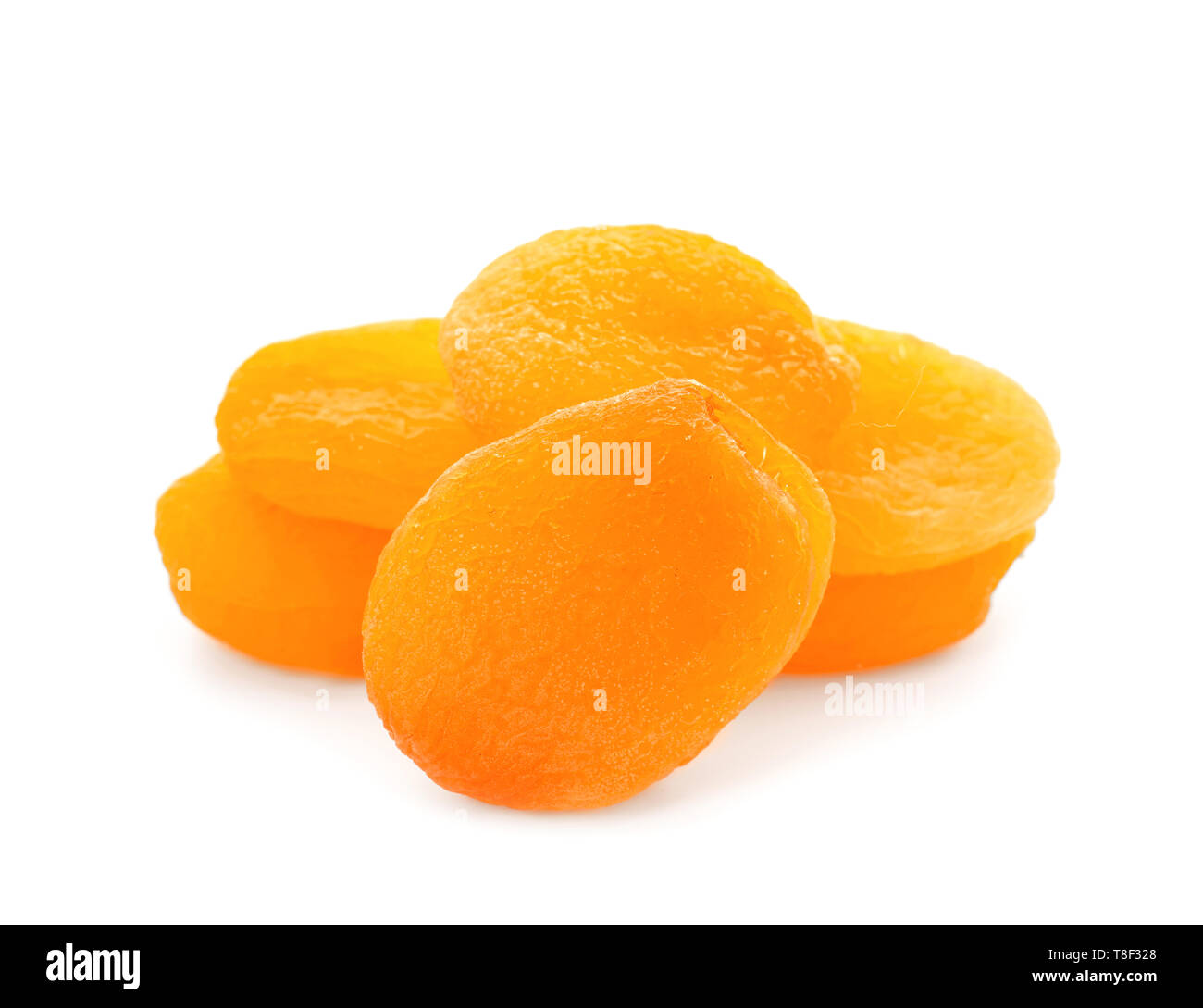 Dried apricots on white background Stock Photo - Alamy