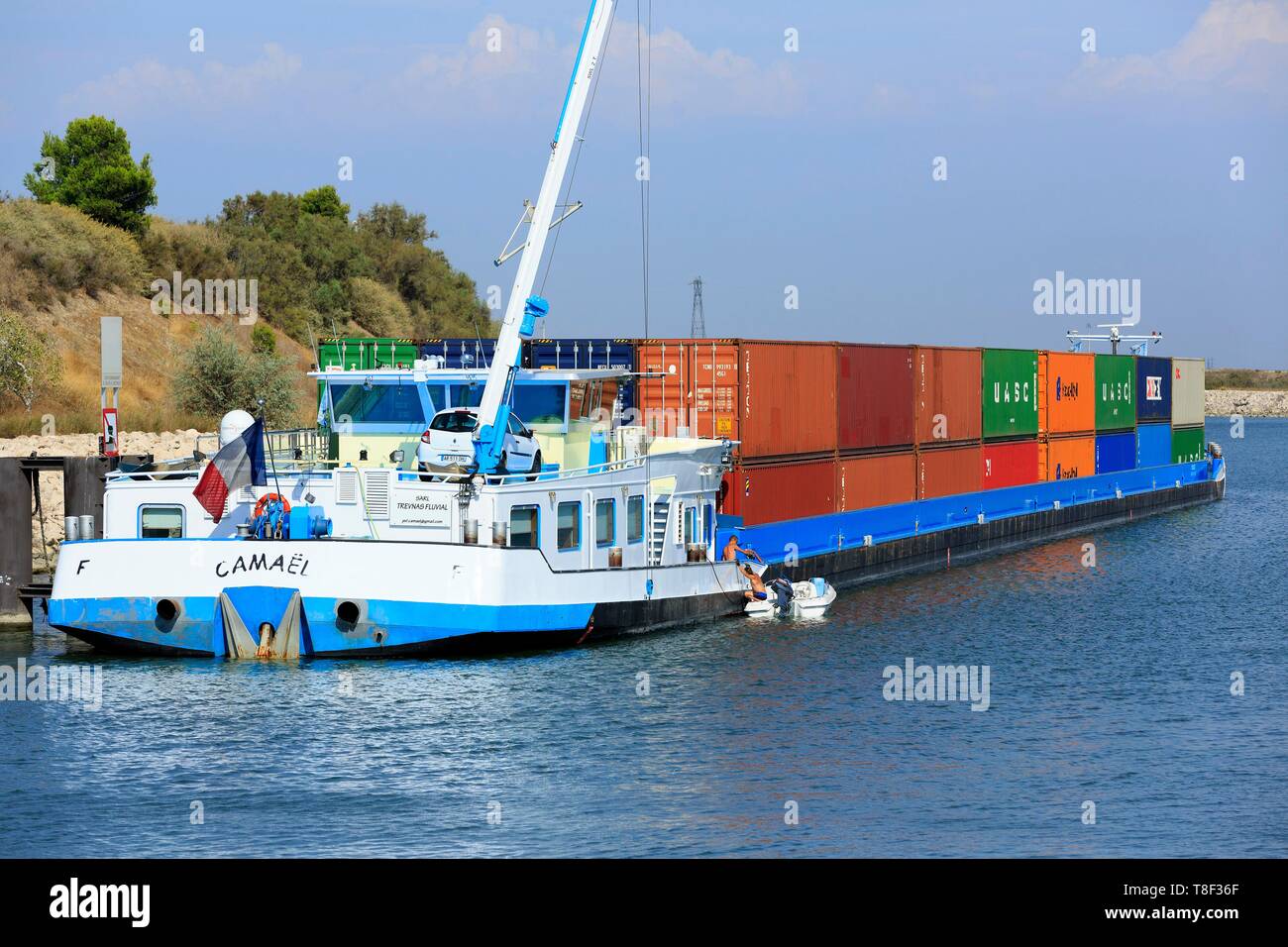 France, Bouches du Rhone, Port Saint Louis du Rhone, container barge on ...