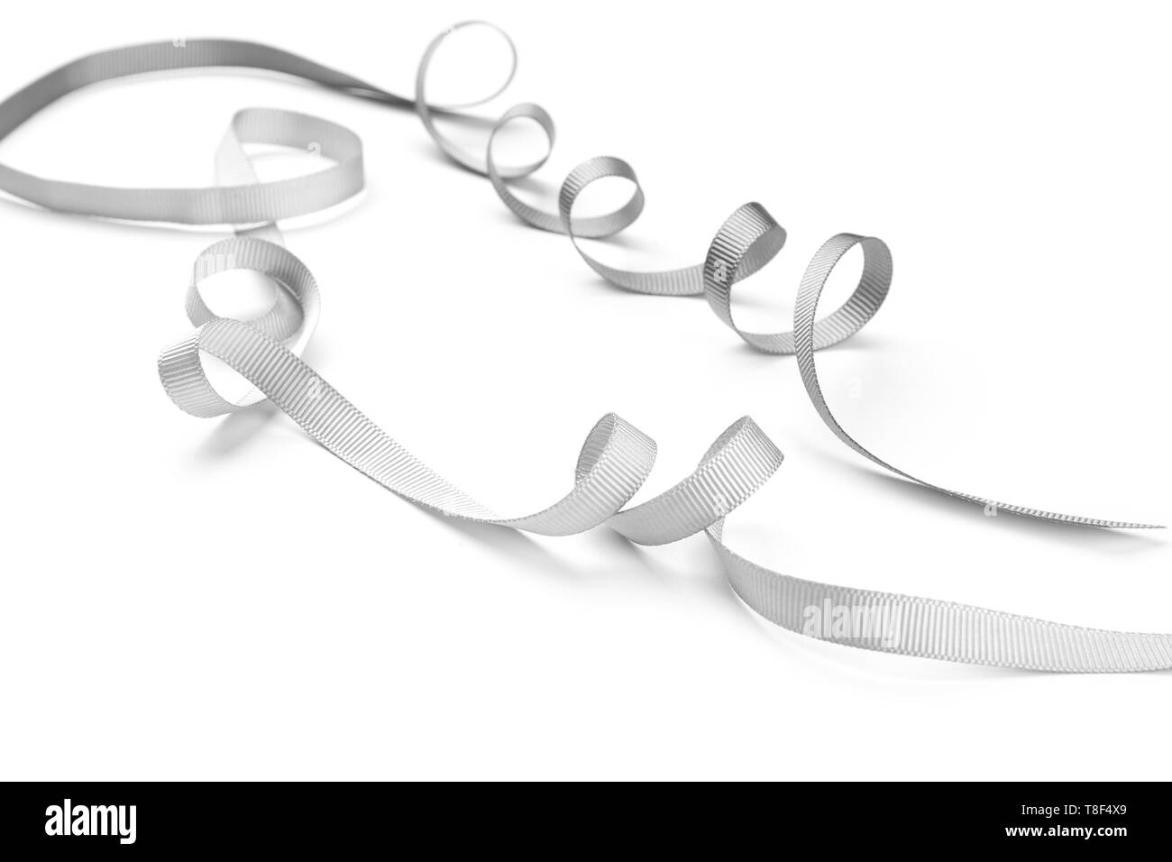 Silver ribbon on white background Stock Photo - Alamy