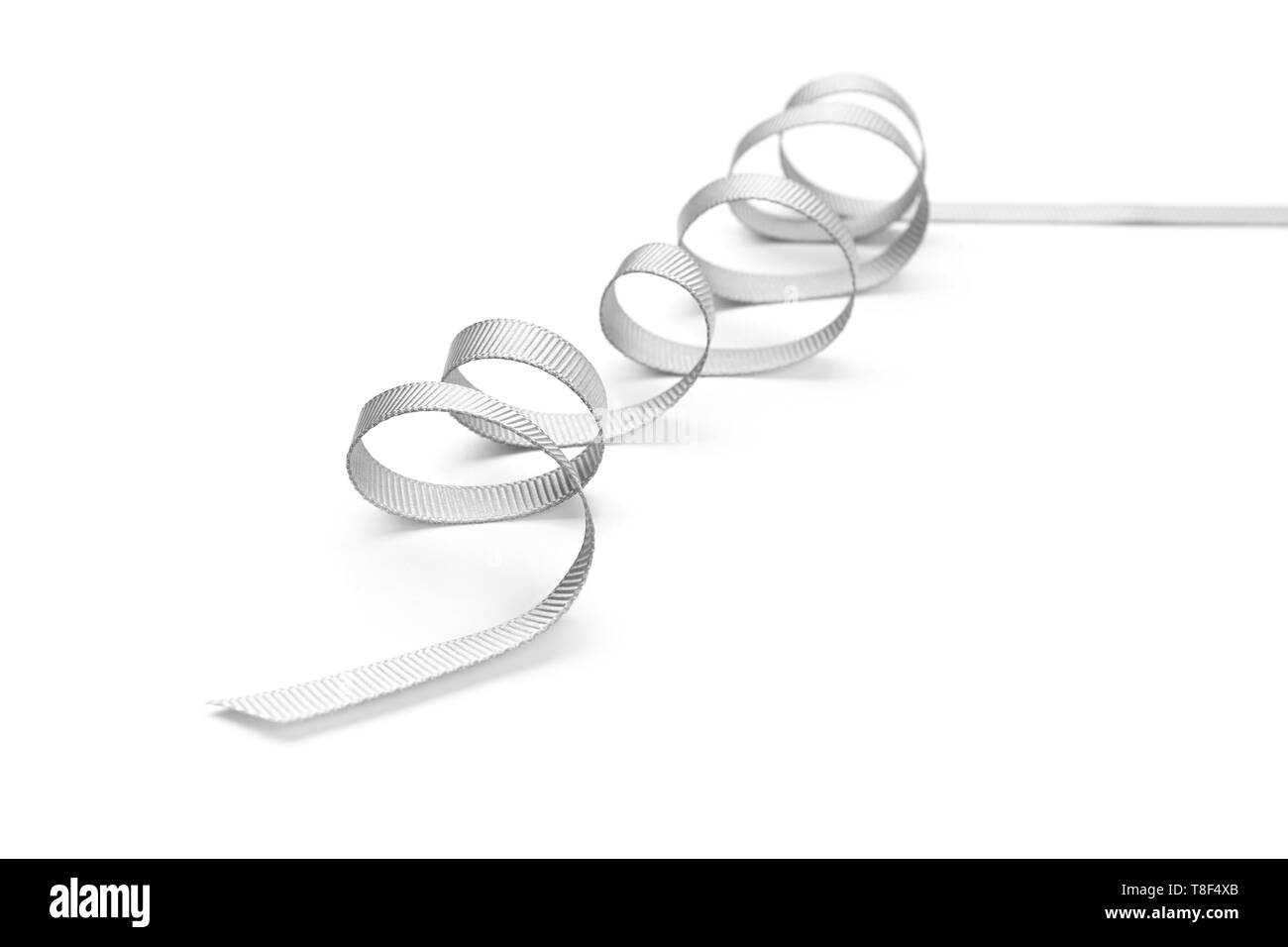 Silver ribbon on white background Stock Photo - Alamy