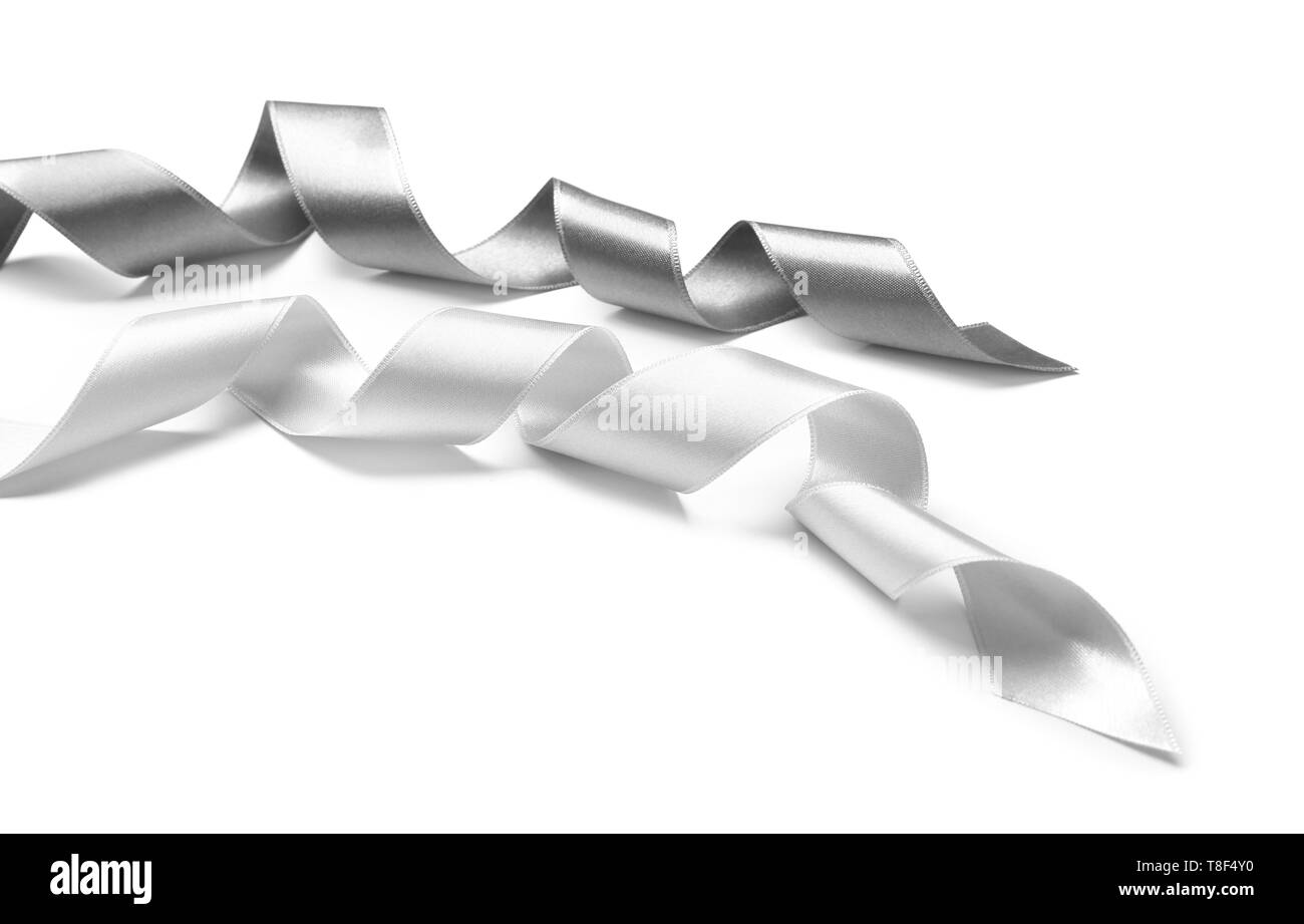 Silver ribbons on white background Stock Photo - Alamy