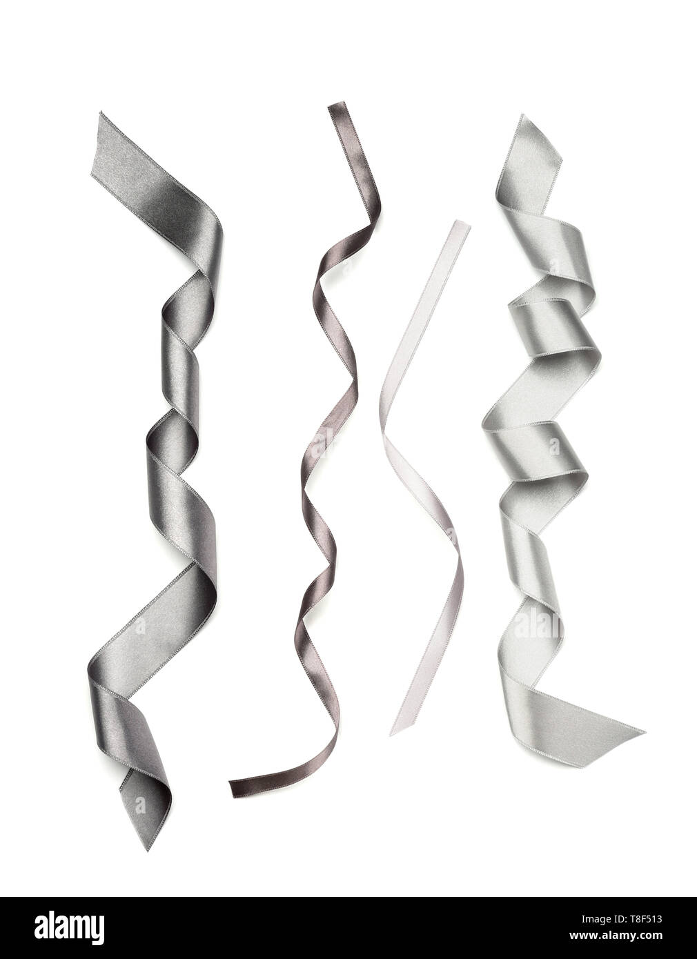 Silver ribbons on white background Stock Photo - Alamy