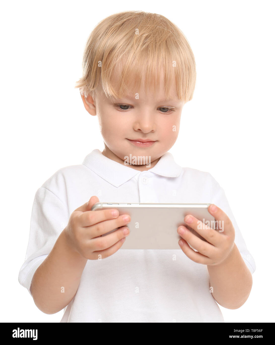 Cute little boy with mobile phone on white background Stock Photo - Alamy