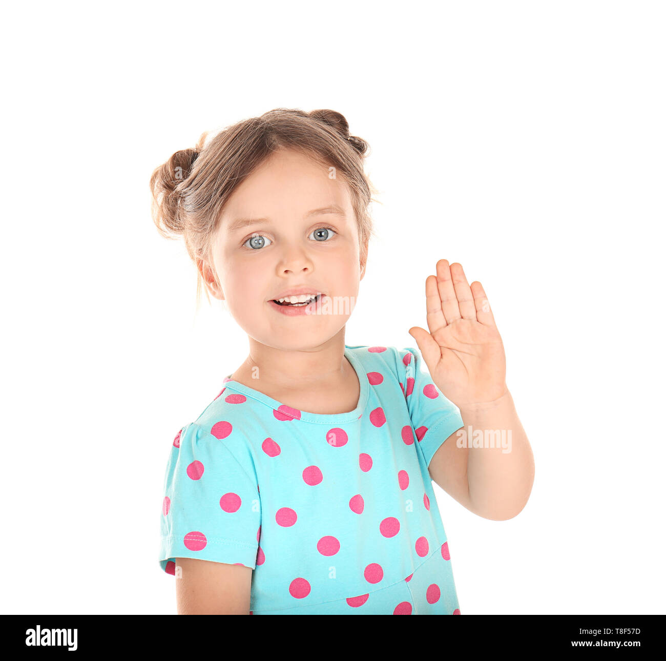 Cute little girl on white background Stock Photo - Alamy