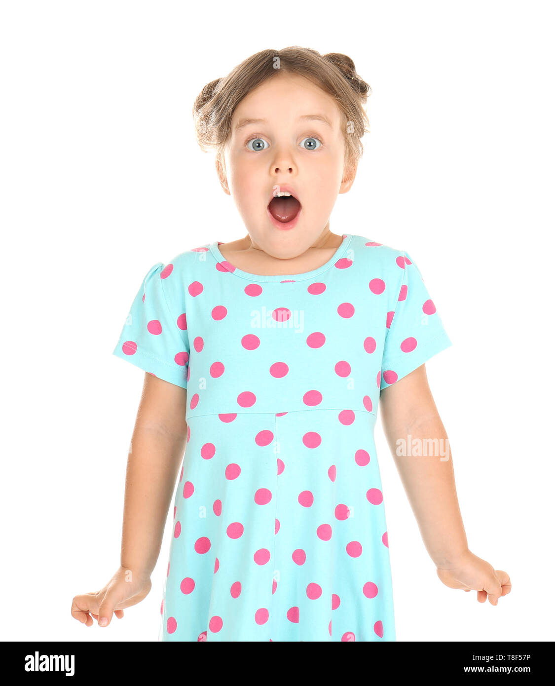 Shocked little girl on white background Stock Photo - Alamy