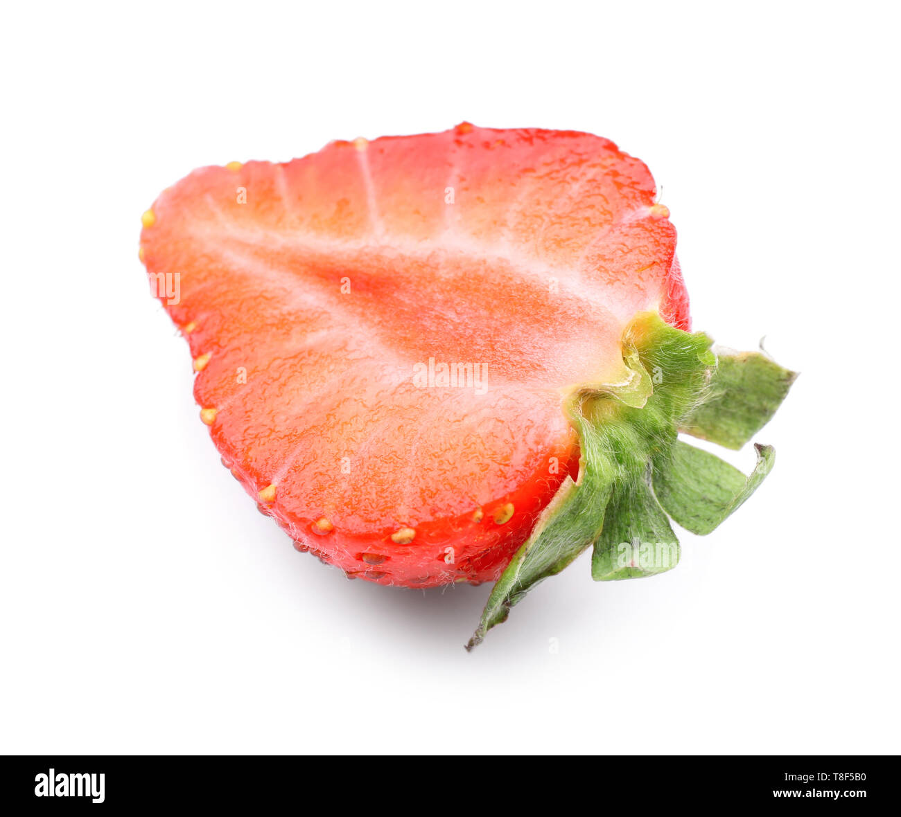 Half of ripe strawberry on white background Stock Photo - Alamy