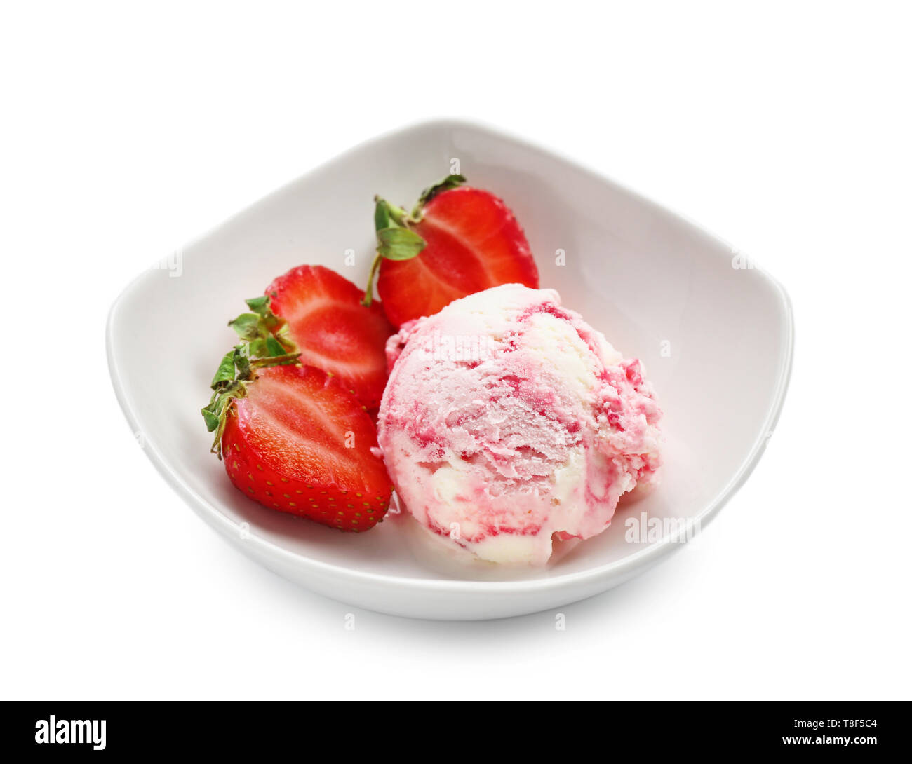 Bowl with delicious strawberry ice-cream on white background Stock ...