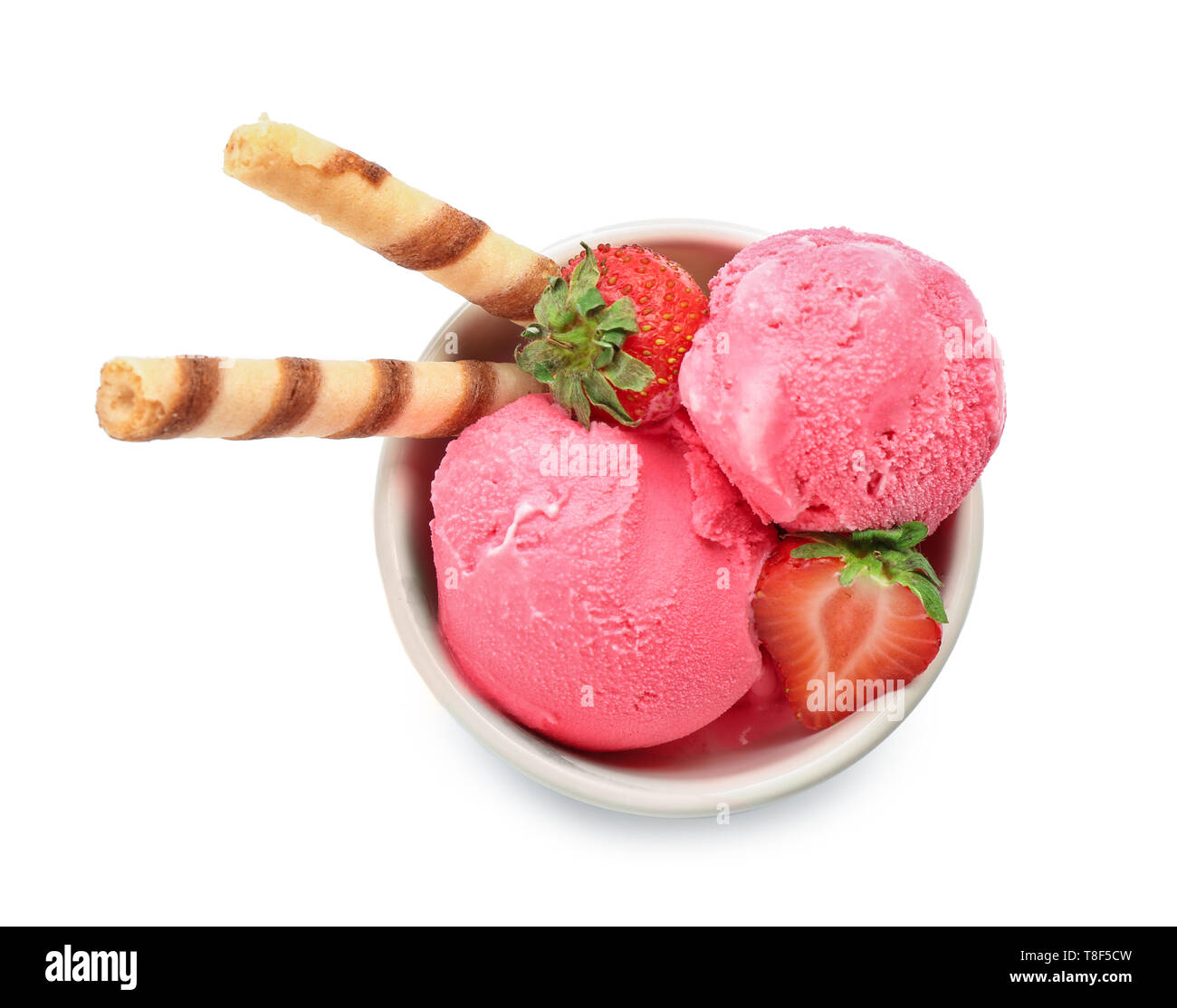 Bowl with delicious strawberry ice-cream on white background Stock ...
