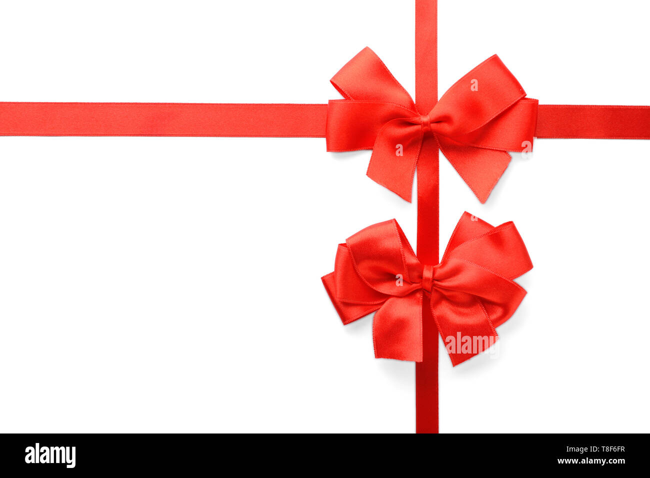 Red ribbons with beautiful bows on white background Stock Photo - Alamy