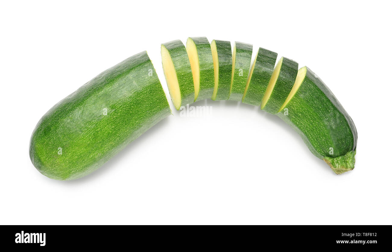 Fresh cut zucchini isolated on white Stock Photo - Alamy