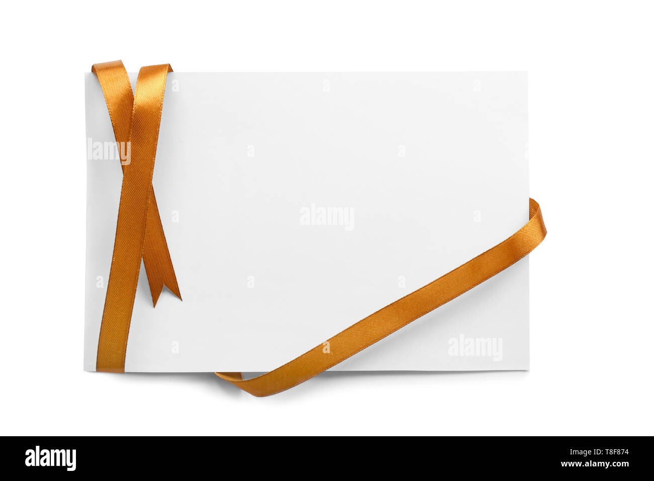 Blank sheet of paper with golden ribbon on white background Stock Photo ...