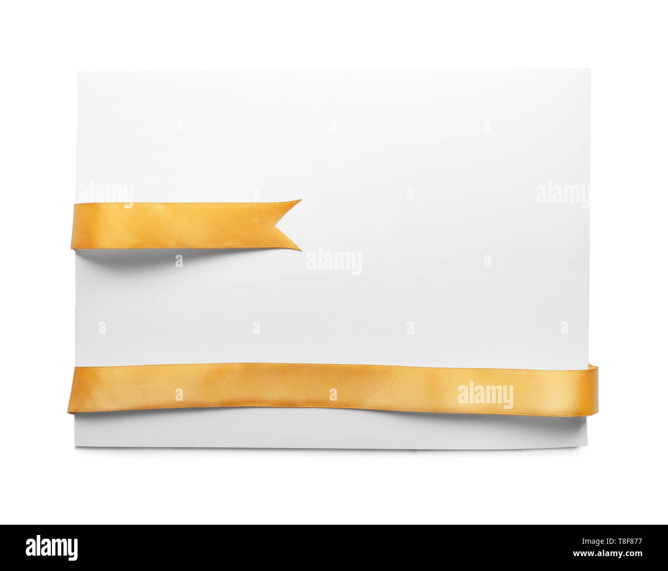 Blank sheet of paper with golden ribbon on white background Stock Photo ...